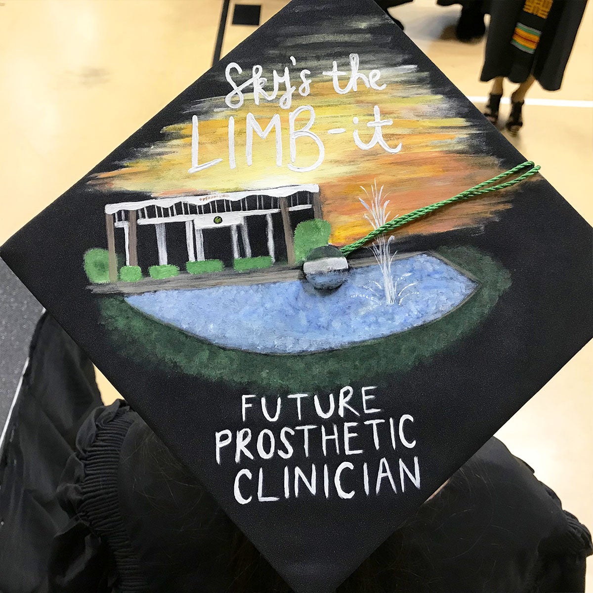 Students Decorate their UCF Graduation Caps for a Good Cause